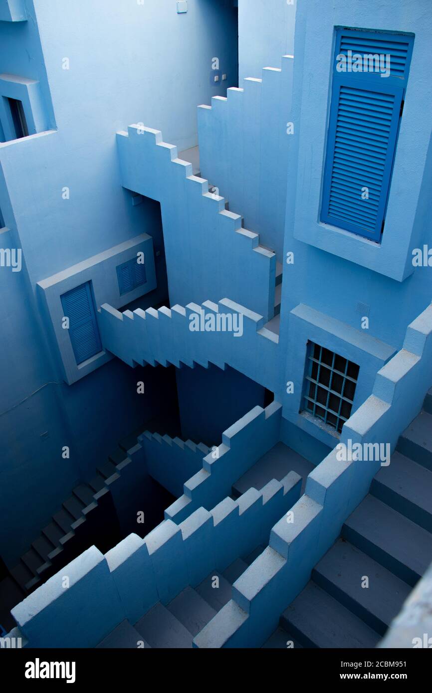 Blue courtyard with blue stairs Stock Photo - Alamy