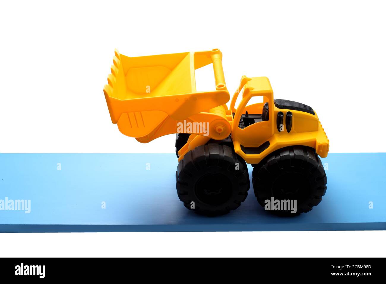 Earthmover Toy on White Background Stock Photo - Alamy