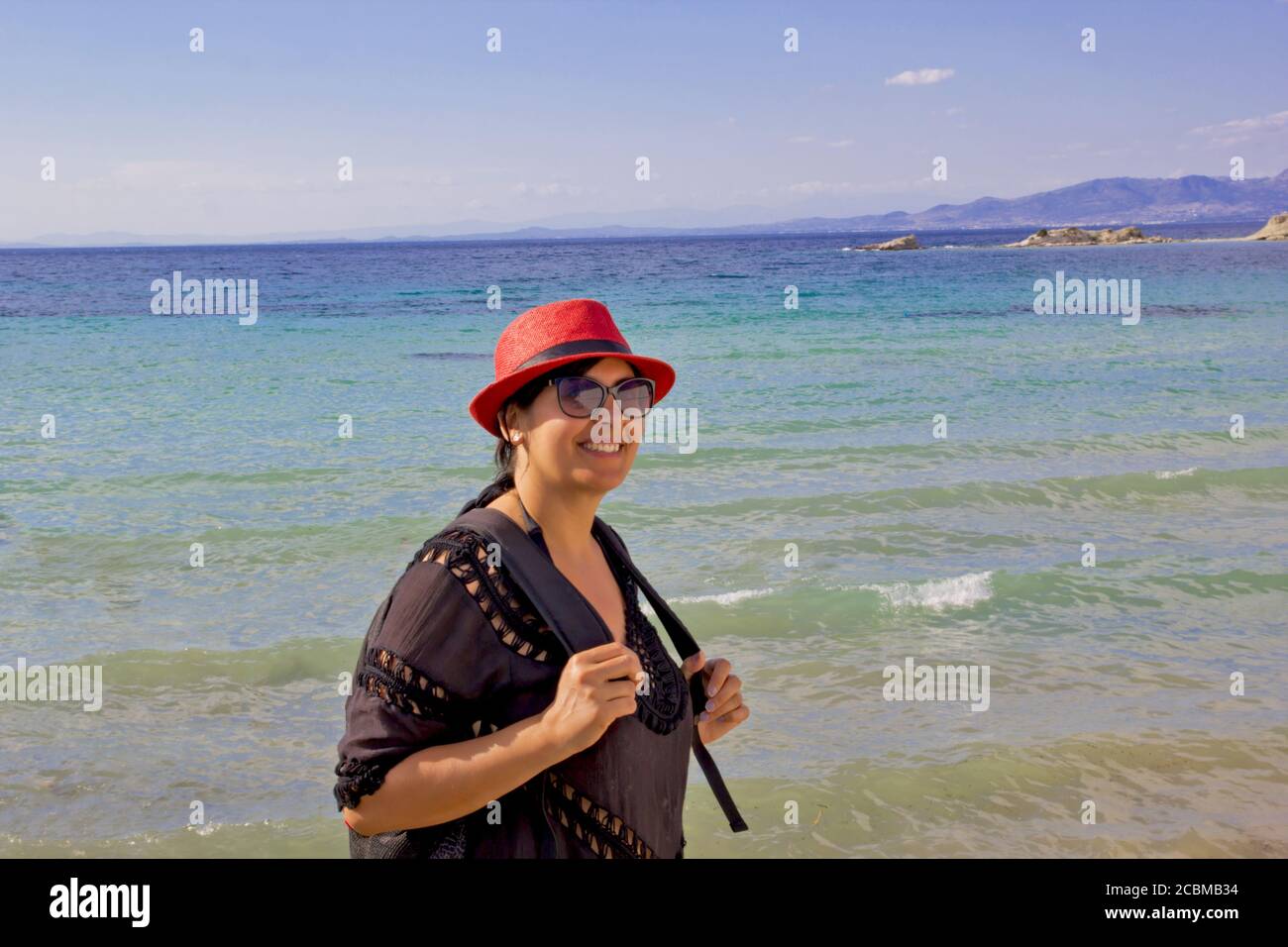 Beautiful woman red backpack walking hi-res stock photography and ...