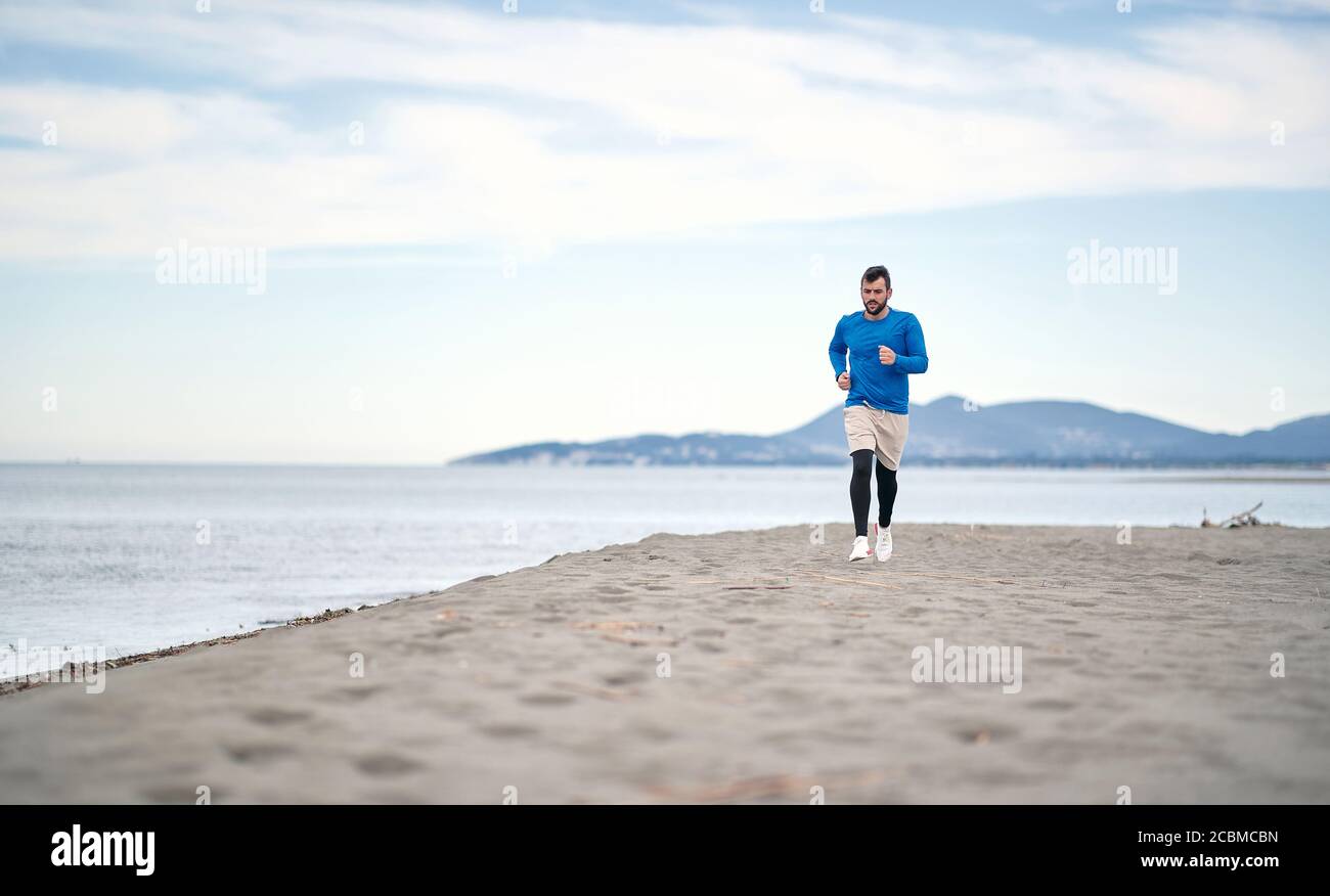 Morning workout on the beach hi-res stock photography and images - Alamy