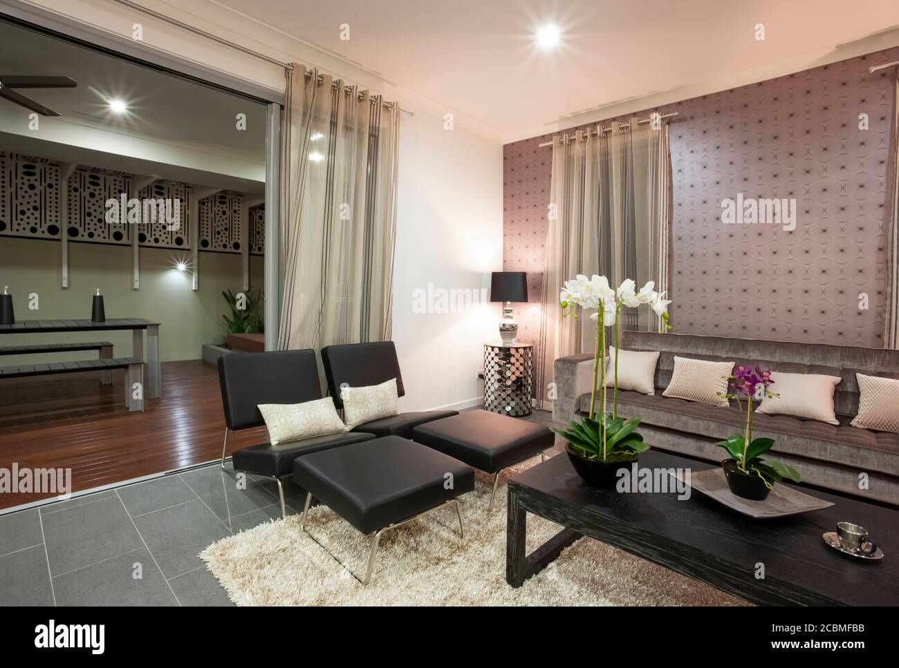 A modern cozy living room interior design Stock Photo - Alamy