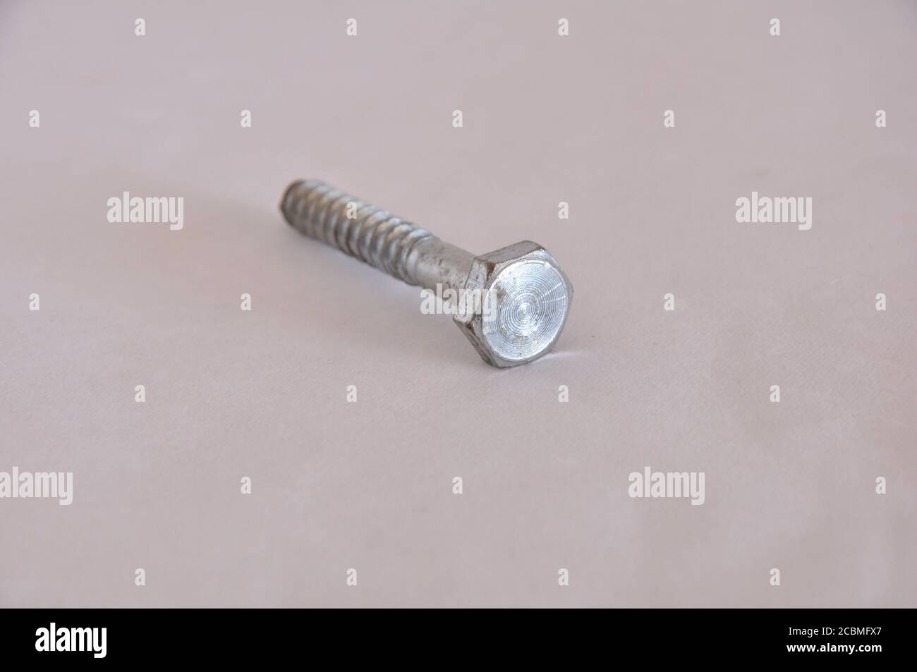 Hexagonal steel screw used in the most diverse types of construction on ...