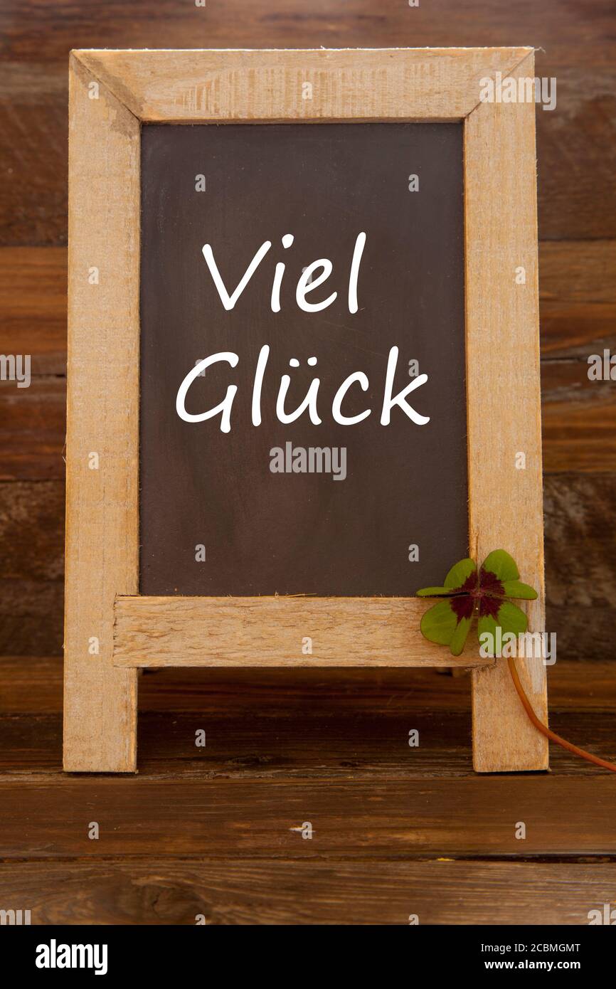 Menu board with good luck message in german Stock Photo - Alamy