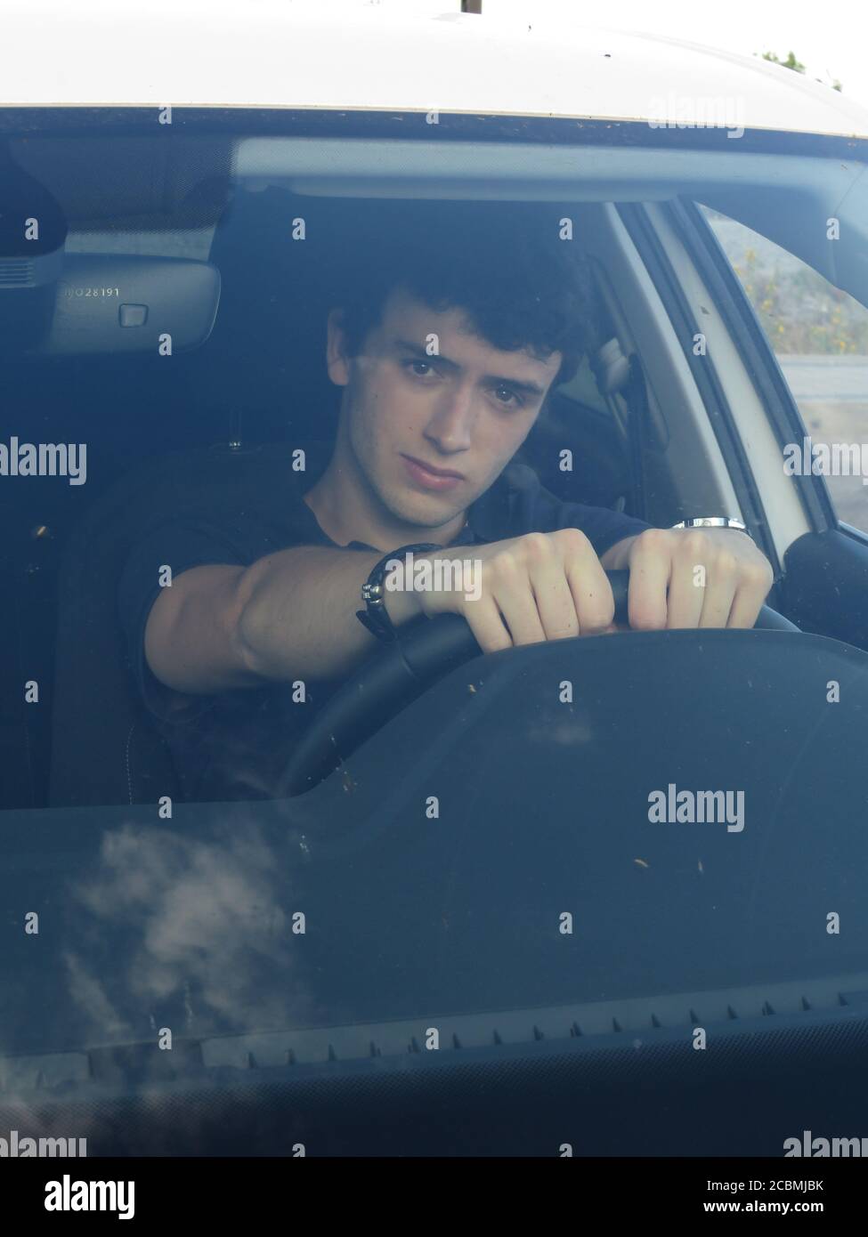 a boy driving Stock Photo - Alamy
