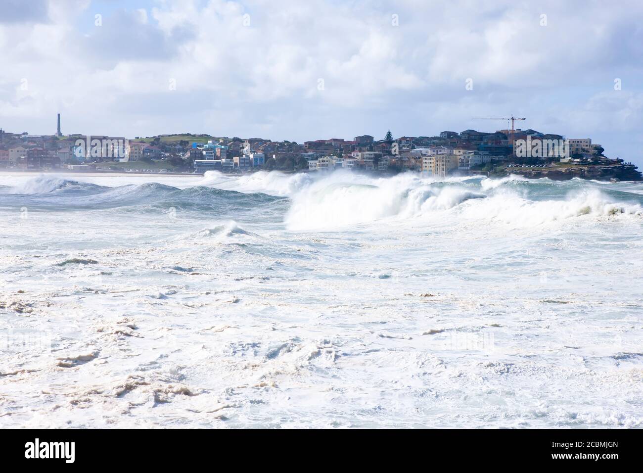 Foamy stong waves crashing in the ocean Stock Photo - Alamy