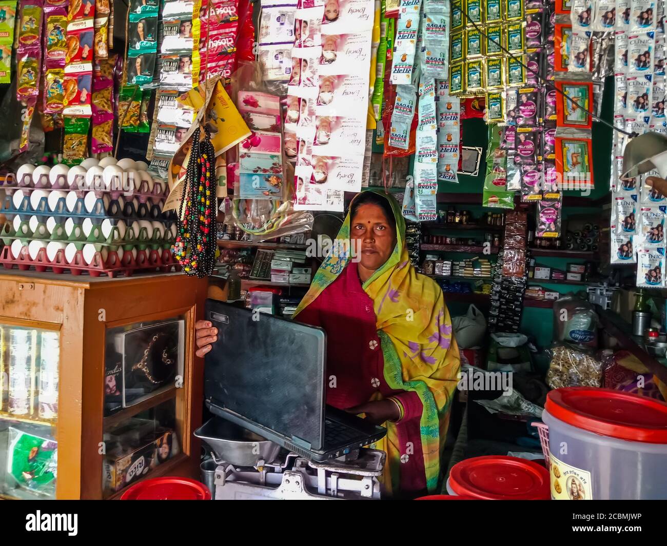 DISTRICT KATNI, INDIA - JANUARY 01, 2020: An indian shopkeeper lady ...