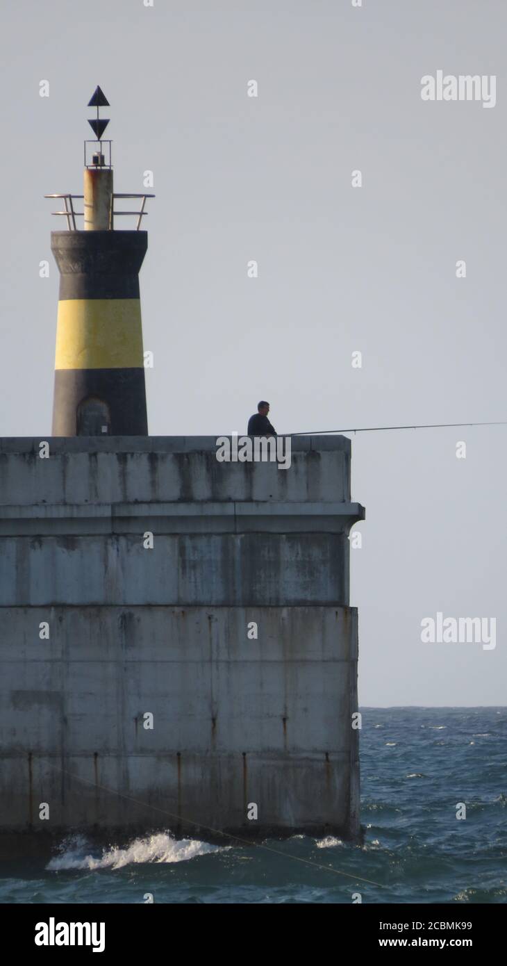 Fishing in lighthouse Stock Photo - Alamy
