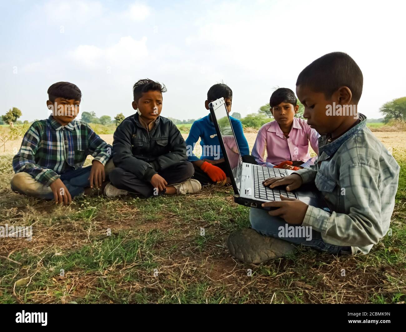 DISTRICT KATNI, INDIA - JANUARY 01, 2020: An indian poor boy teaching ...