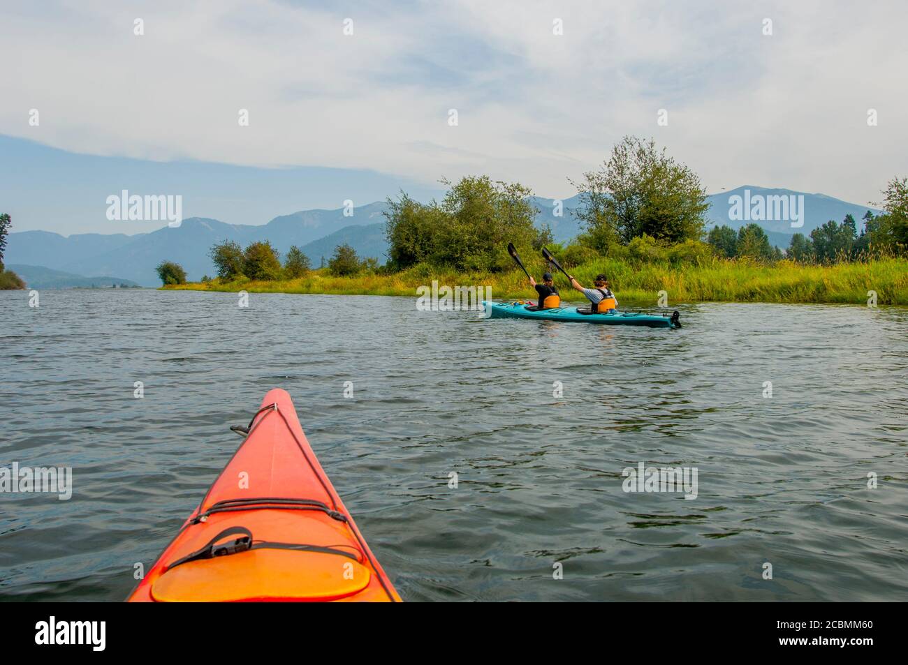 Kayaking at the Johnson Creek area on Lake Pend Oreille, the largest ...