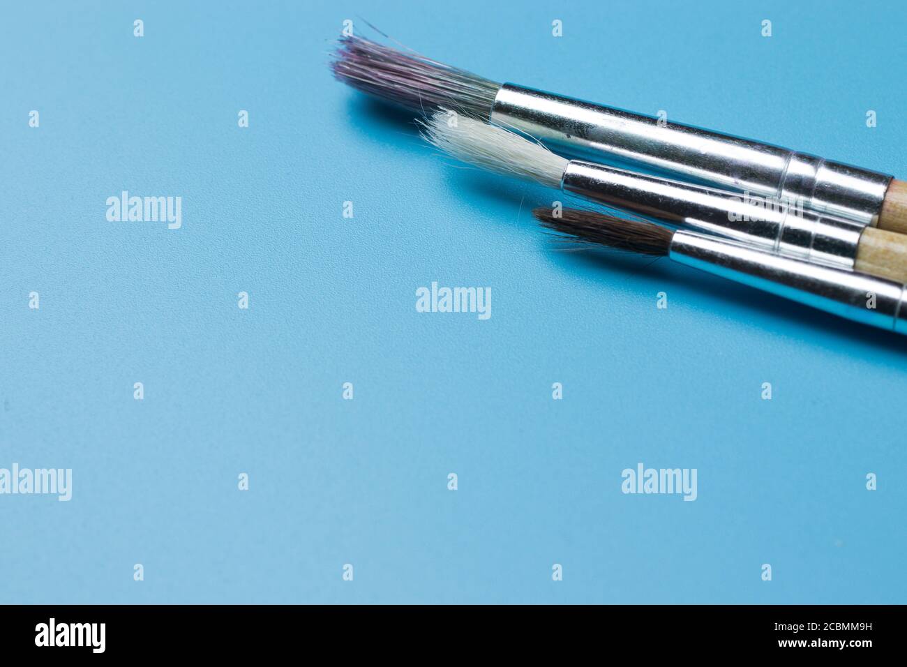 Art brushes top view on background with copy space. Drawing concept ...