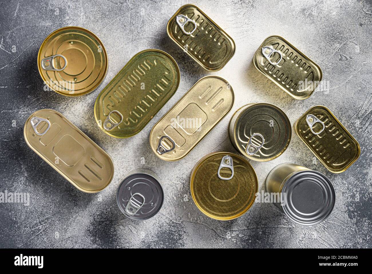 Assortment of cans of canned with different types of shapes top view on ...