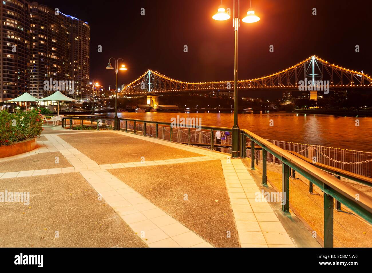 Illuminated Brisbane bridge at night Stock Photo - Alamy