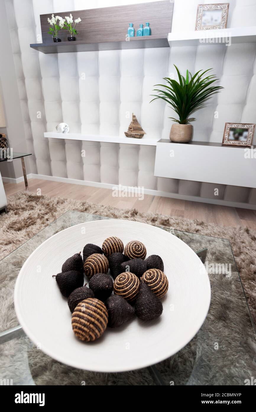 A white plate on a the kitchen table Stock Photo - Alamy