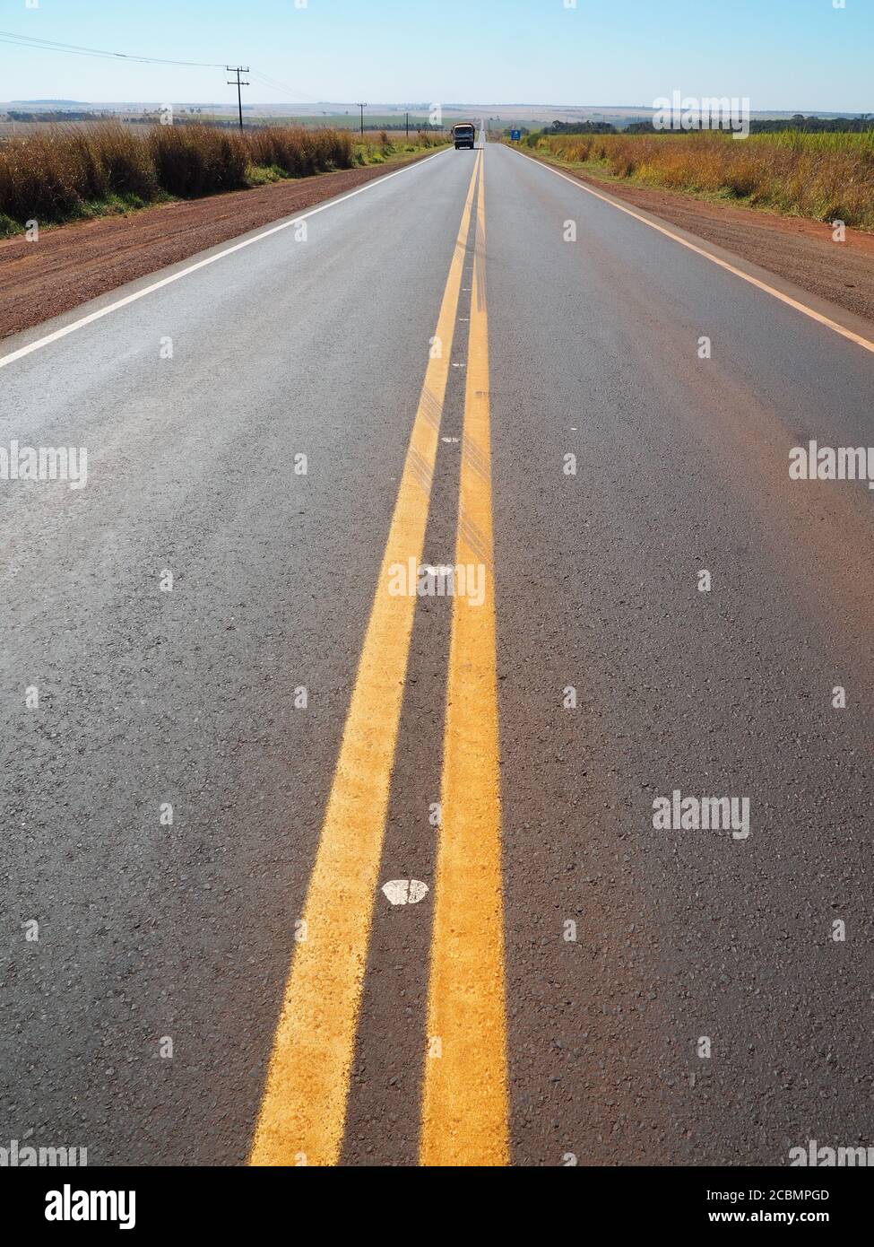 Two way asphalt road Stock Photo - Alamy