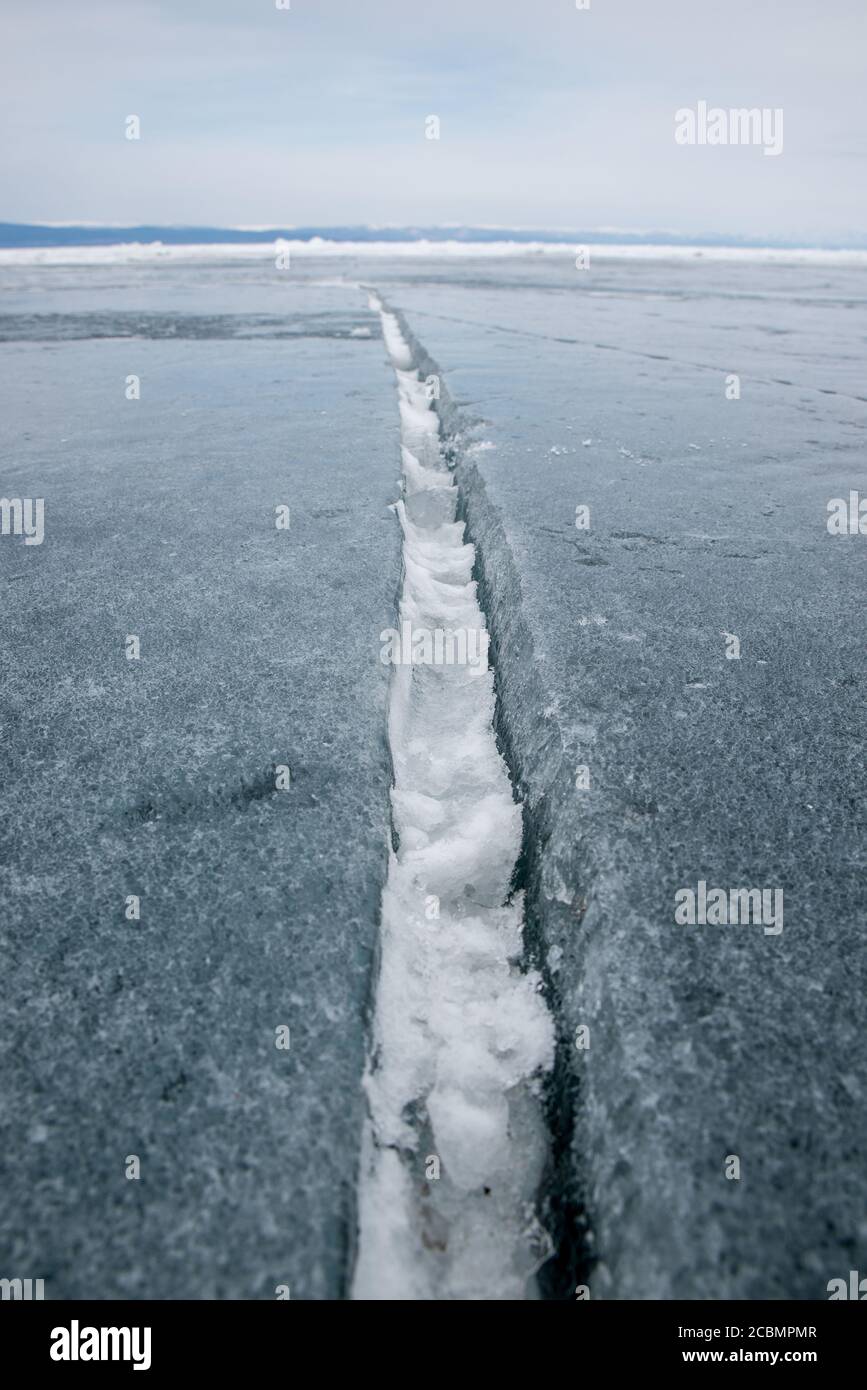 Big ice crack on the frozen surface of Lake Baikal, Russia Stock Photo ...