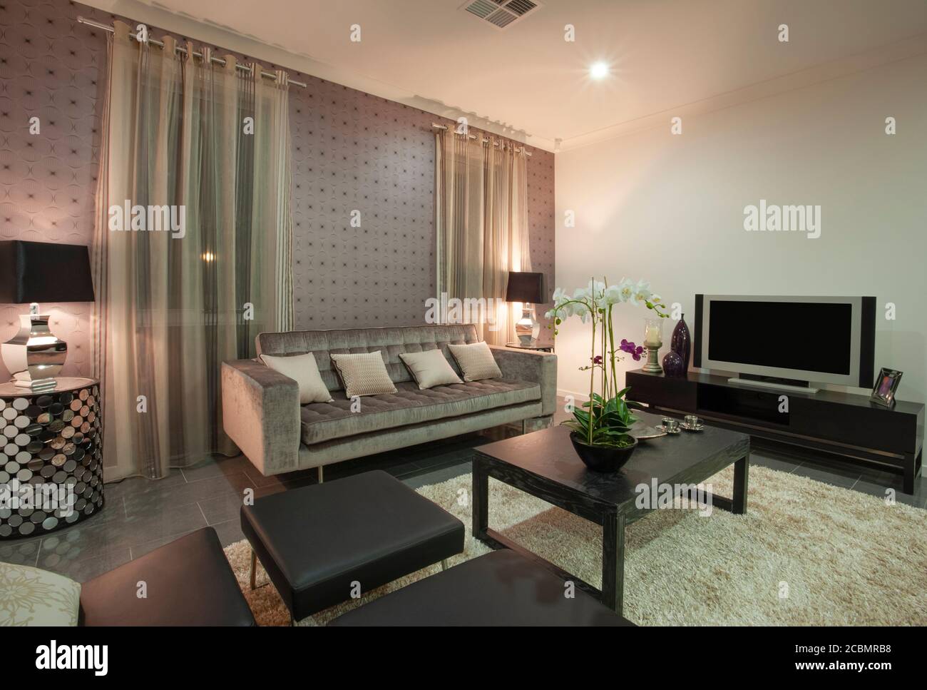 A modern cozy living room interior design Stock Photo - Alamy