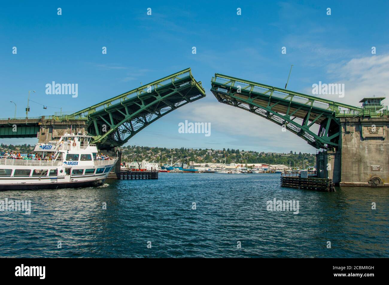 View of the Ballard draw bridge opening for an Argosy excursion boat ...