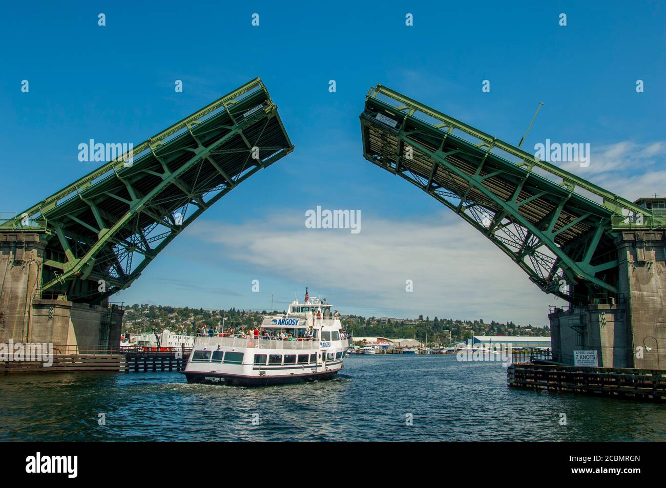 View of the Ballard draw bridge opening for an Argosy excursion boat ...