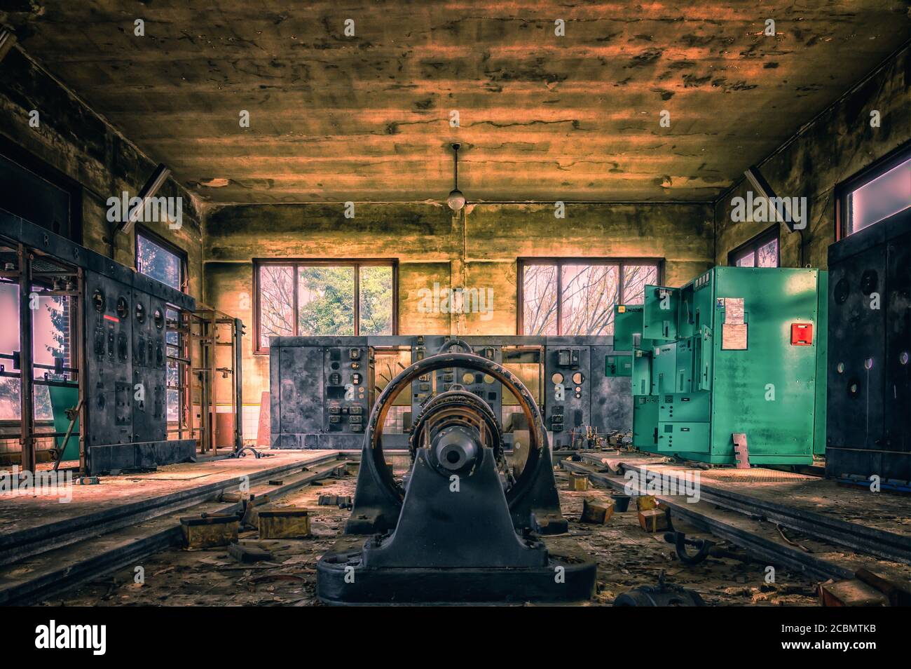 View inside an abandoned factory facility room Stock Photo - Alamy