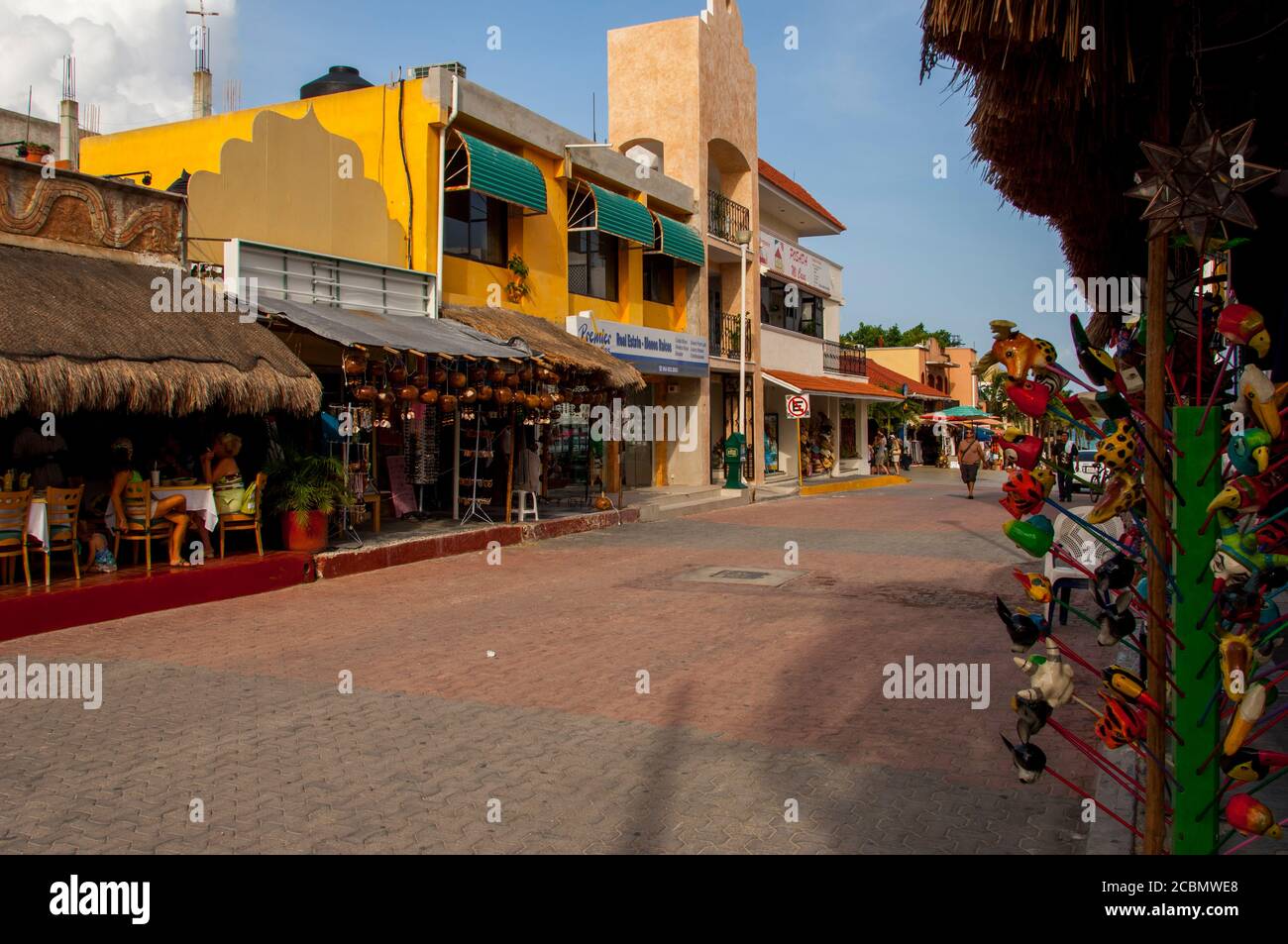 Street scene of 5th Avenue with restaurants and shops in Playa del ...
