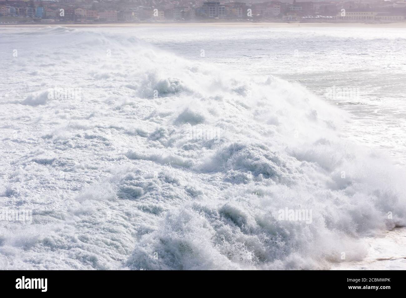Foamy stong waves crashing in the ocean Stock Photo - Alamy