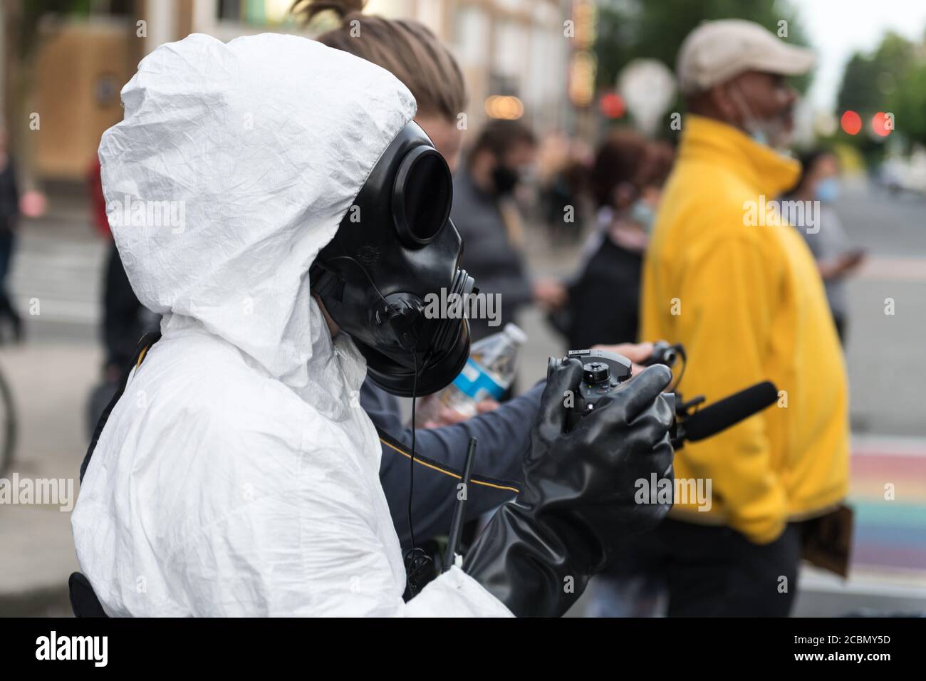 Seattle, USA Jun 4, 2020: A person wearing a bio hazard suit at Chaz ...