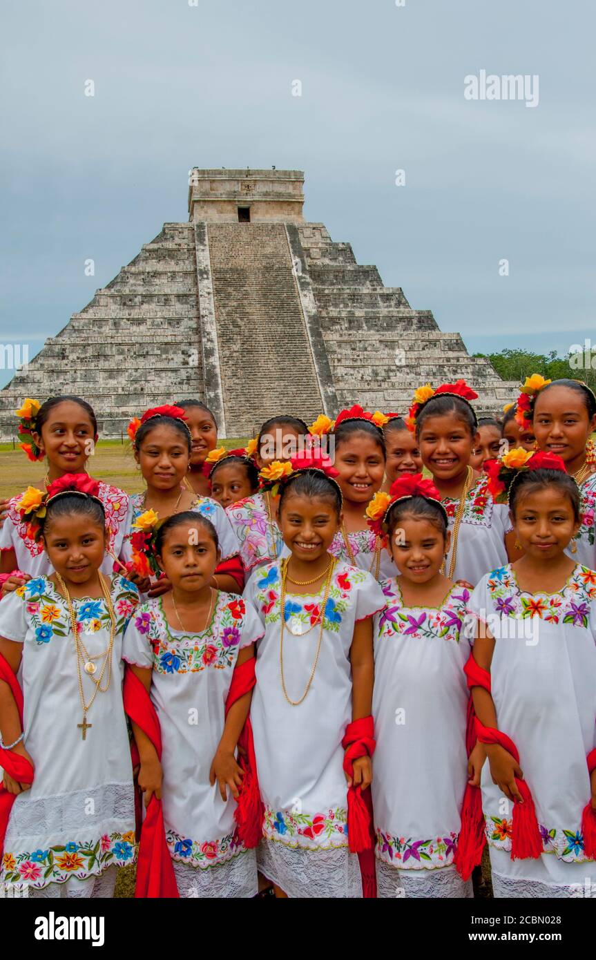 A group of Mayan children (dance group) visiting the Chichen Itza ...