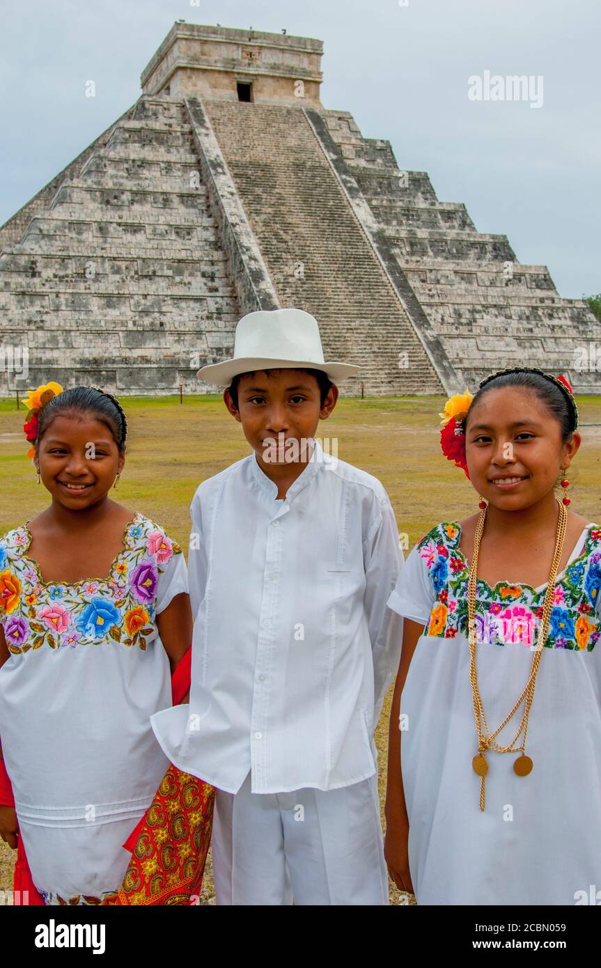 Mayan children (dance group) visiting the Chichen Itza Archaeological ...