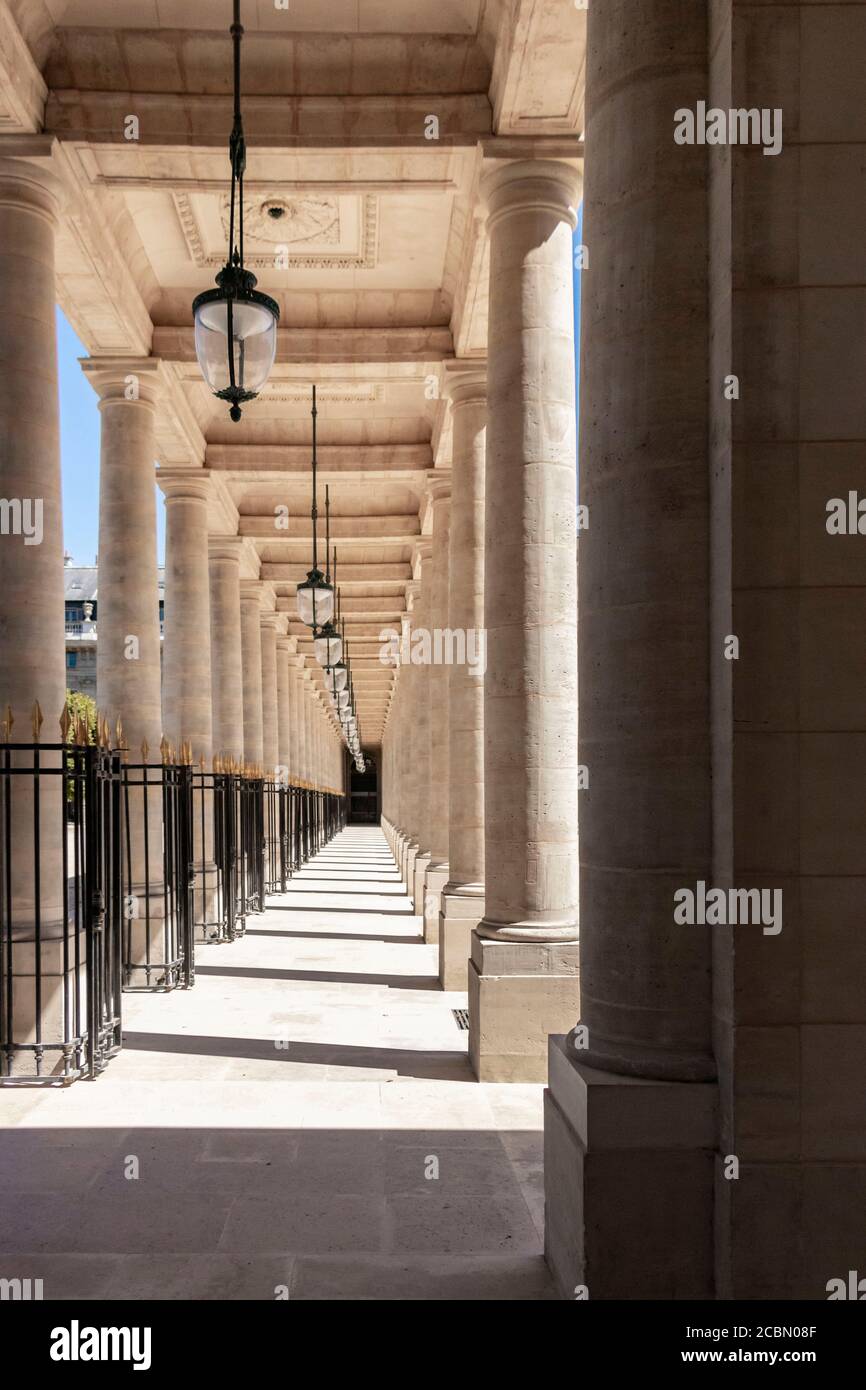 perspective view of stone colonnade in Paris Stock Photo - Alamy