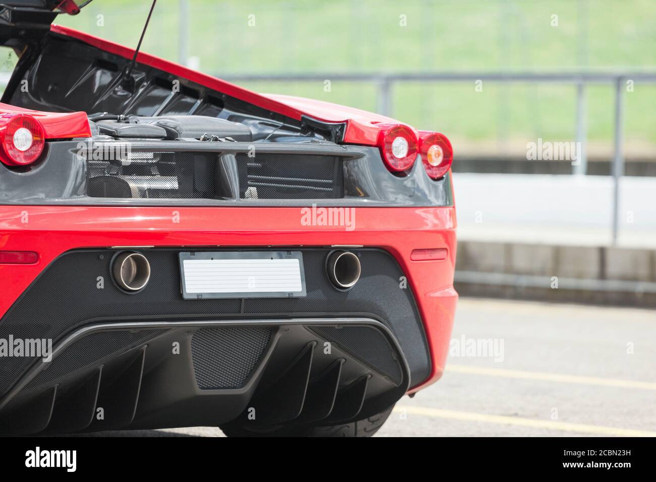 Rear view of a red luxury sportcar Stock Photo - Alamy
