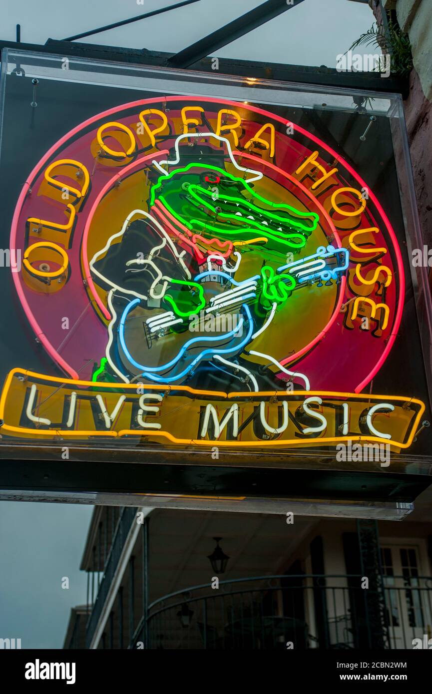 A colorful neon sign of a bar on Bourbon Street in the historic French ...