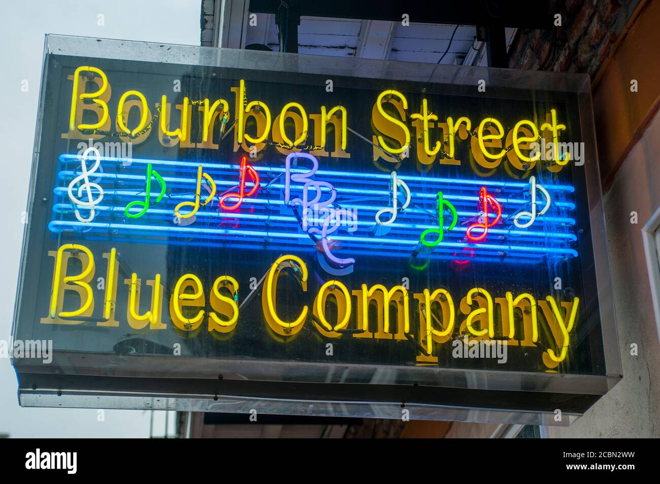 A colorful neon sign of a bar on Bourbon Street in the historic French ...