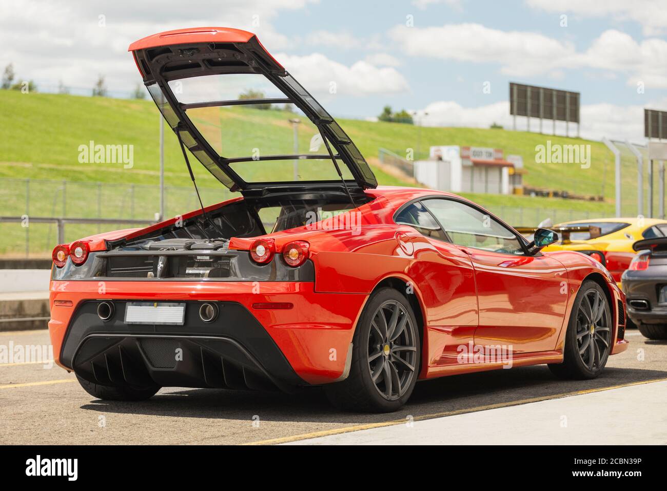 Rear view of a red luxury sportcar Stock Photo - Alamy