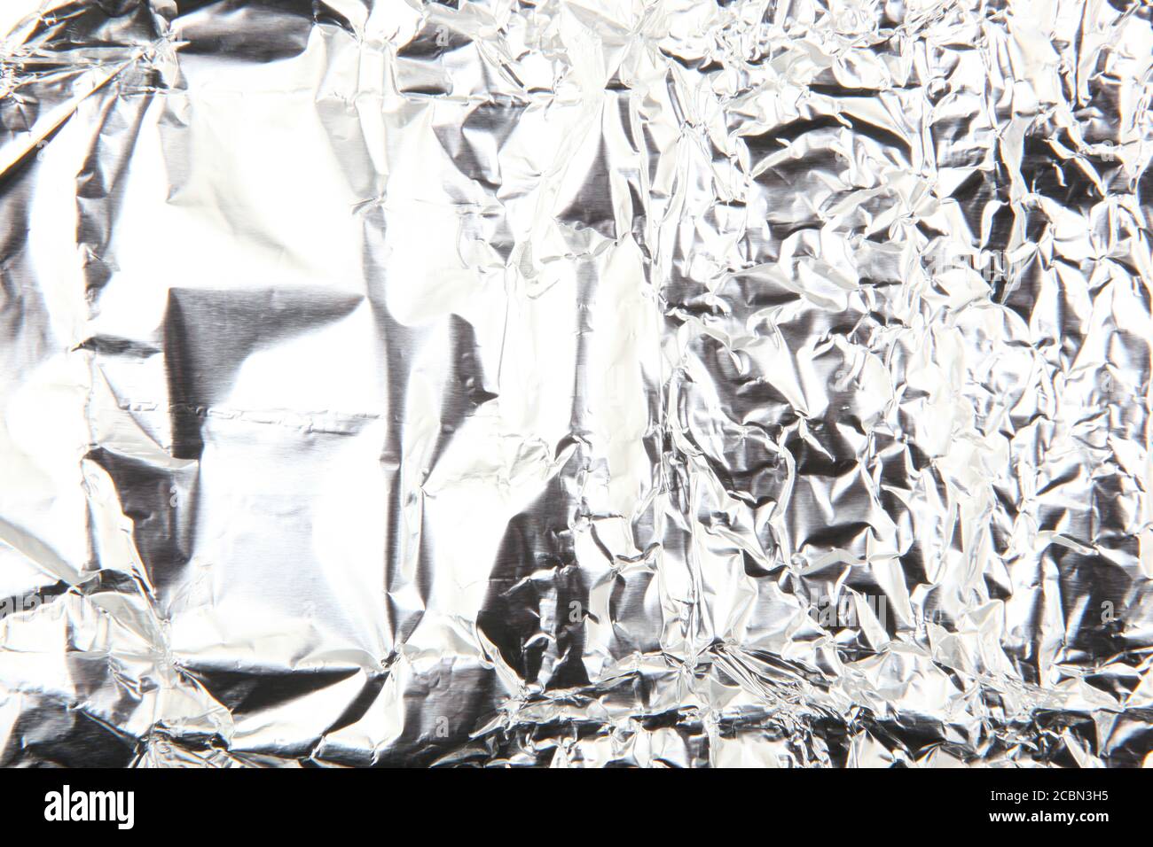 Scrunched shiny aluminum foil surface Stock Photo - Alamy