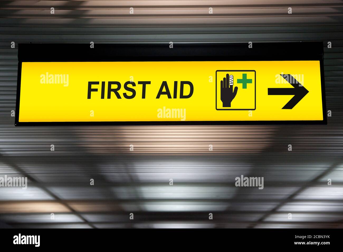 First aid medical station sign hanging from ceiling at the airport ...