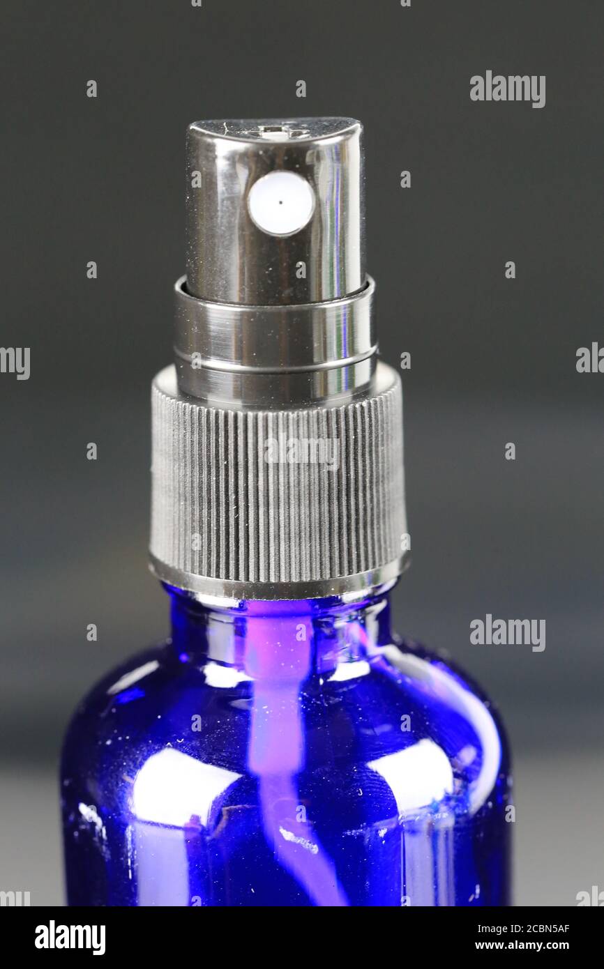 Blue colored Essential Oil health bottle on a white background Stock ...