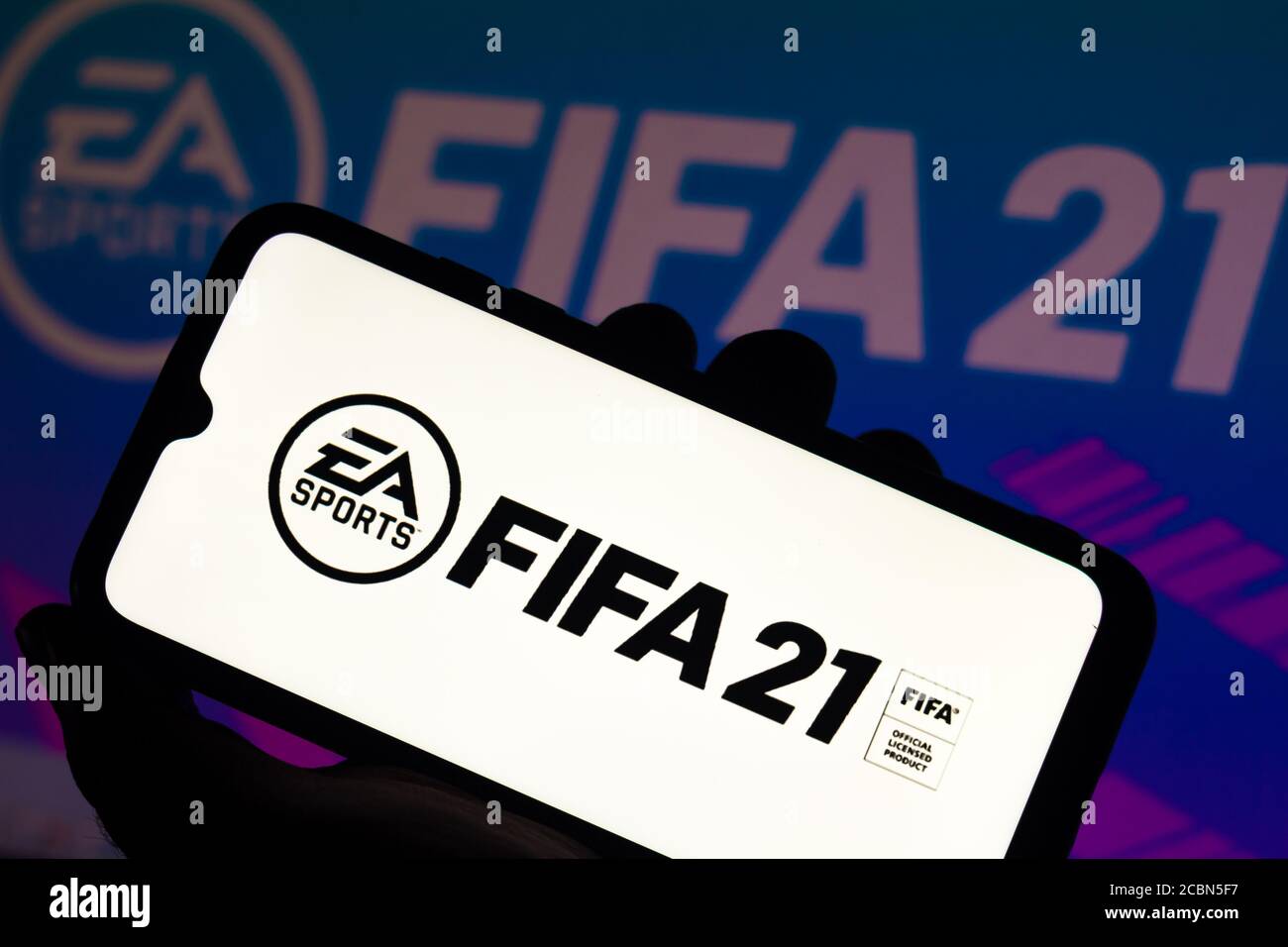 In this photo illustration the FIFA 21 logo is displayed on a ...