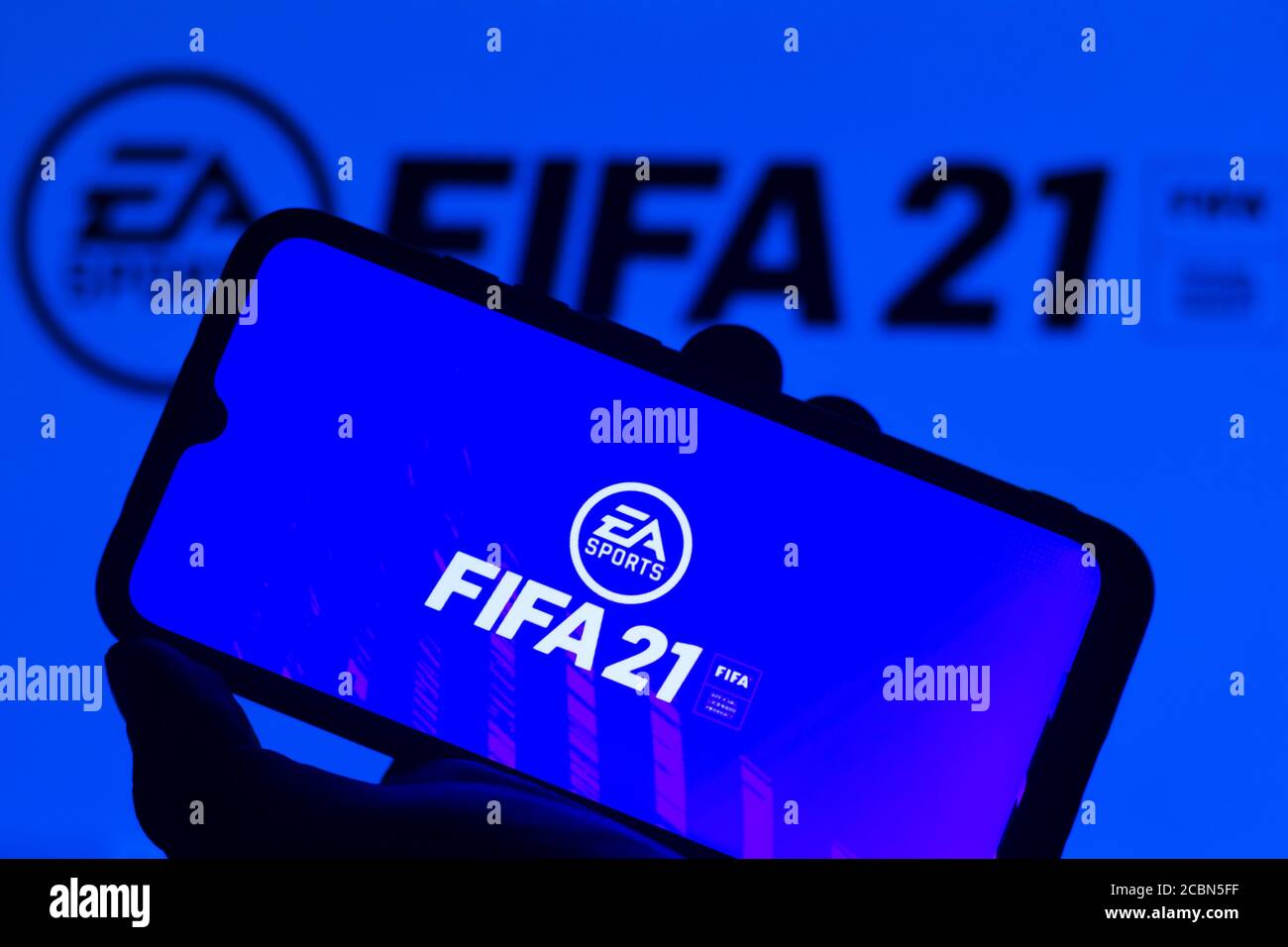 In this photo illustration the FIFA 21 logo is displayed on a ...