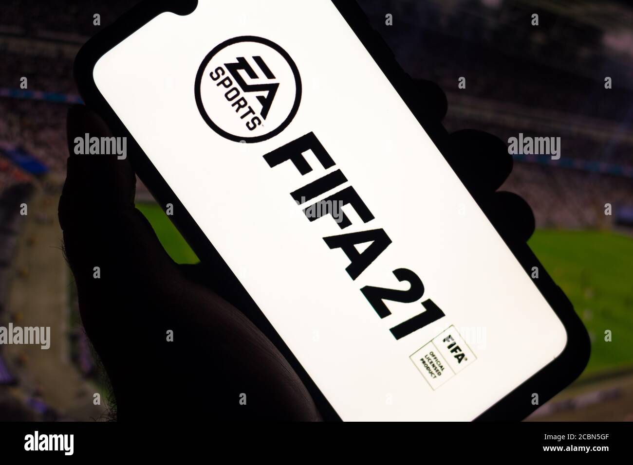 In this photo illustration the FIFA 21 logo is displayed on a ...