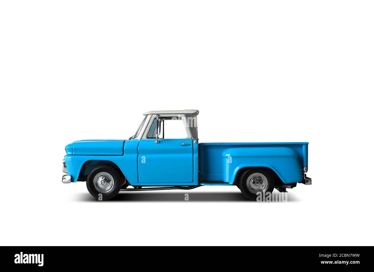 Retro blue pickup on a light background Stock Photo - Alamy