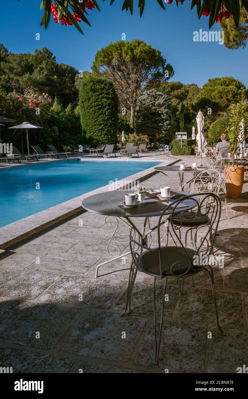 breakfast by the pool of an luxury hotel in the Provence France Stock ...
