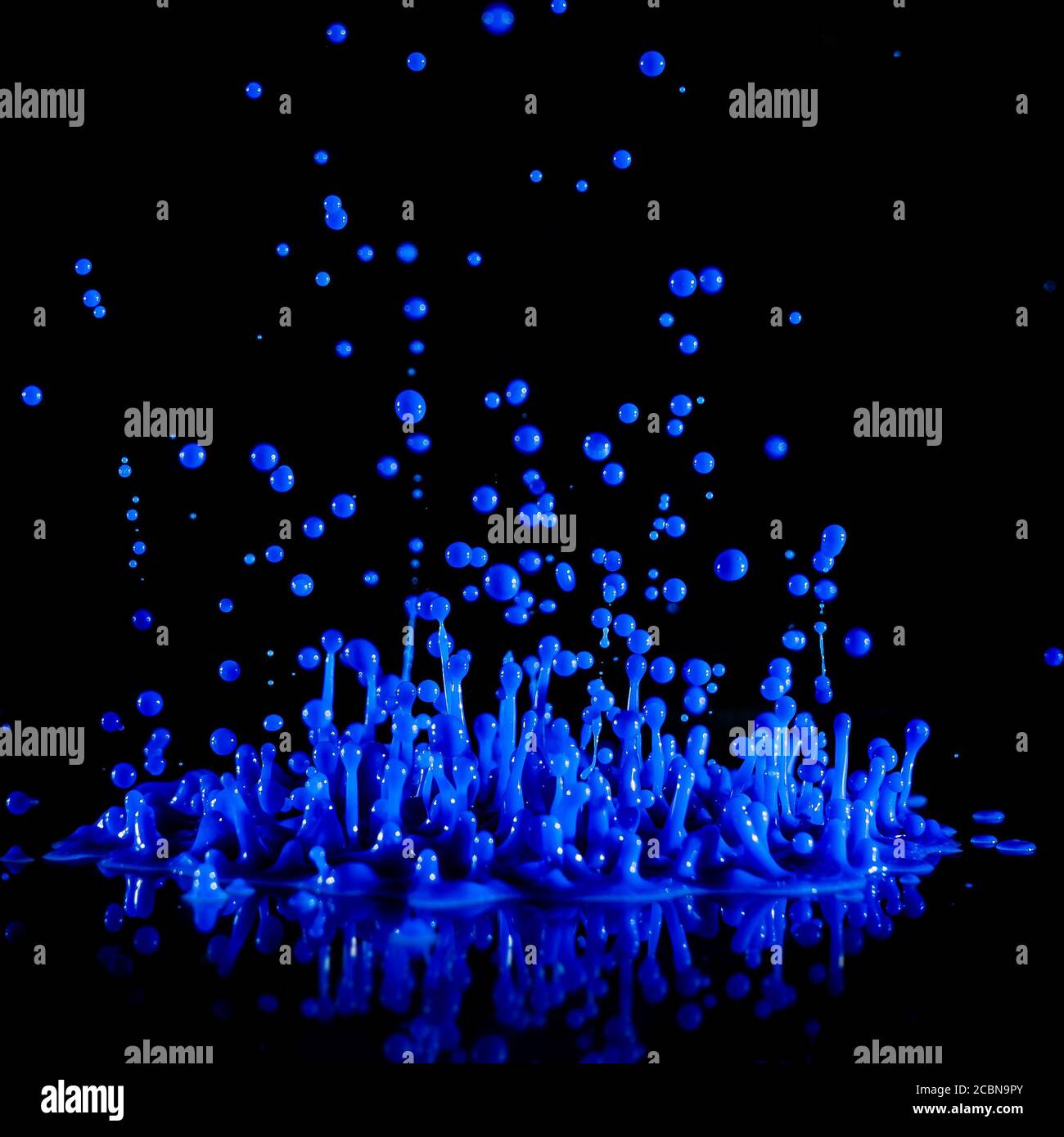 Closeup shot of neon blue paint splash Stock Photo - Alamy