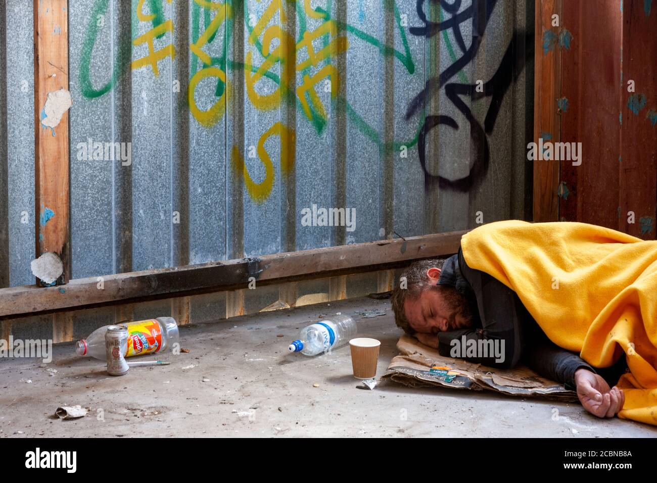 Barefoot homeless man hi-res stock photography and images - Alamy