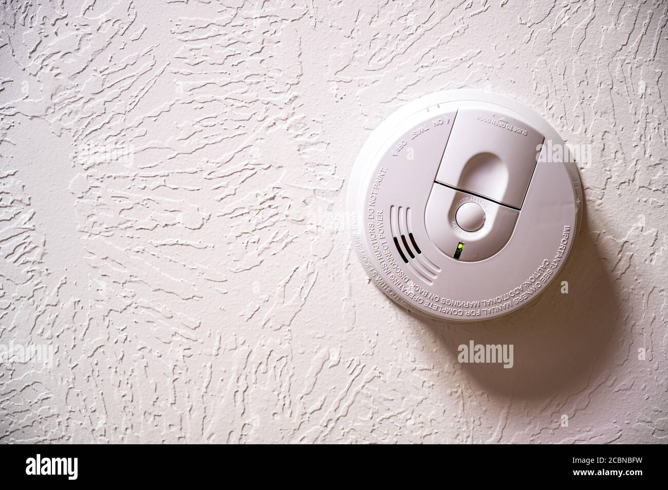 Residential smoke detector with indicator light Stock Photo - Alamy
