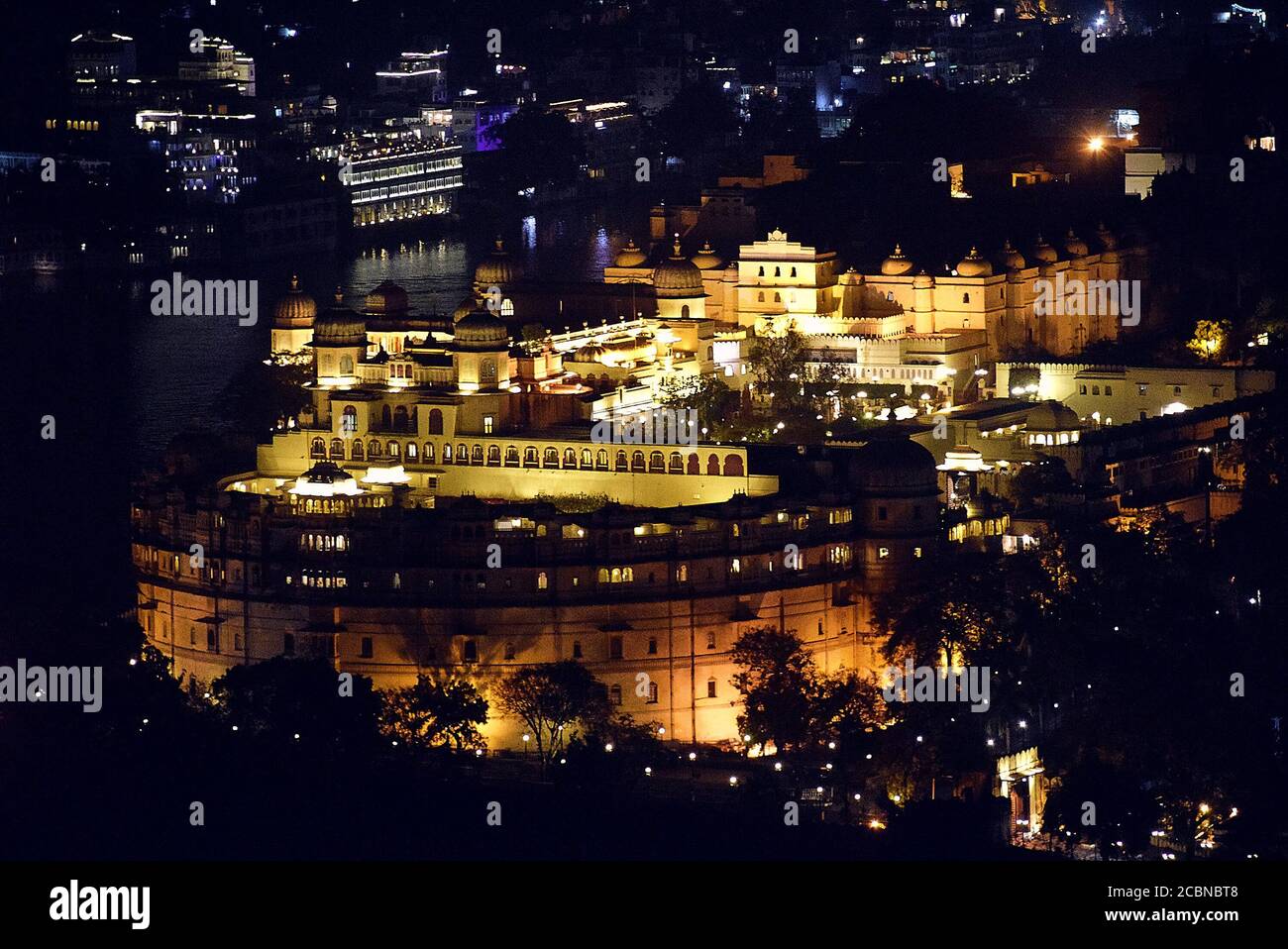 City palace night view from Shri Manshapurna Karni Mata temple for city ...