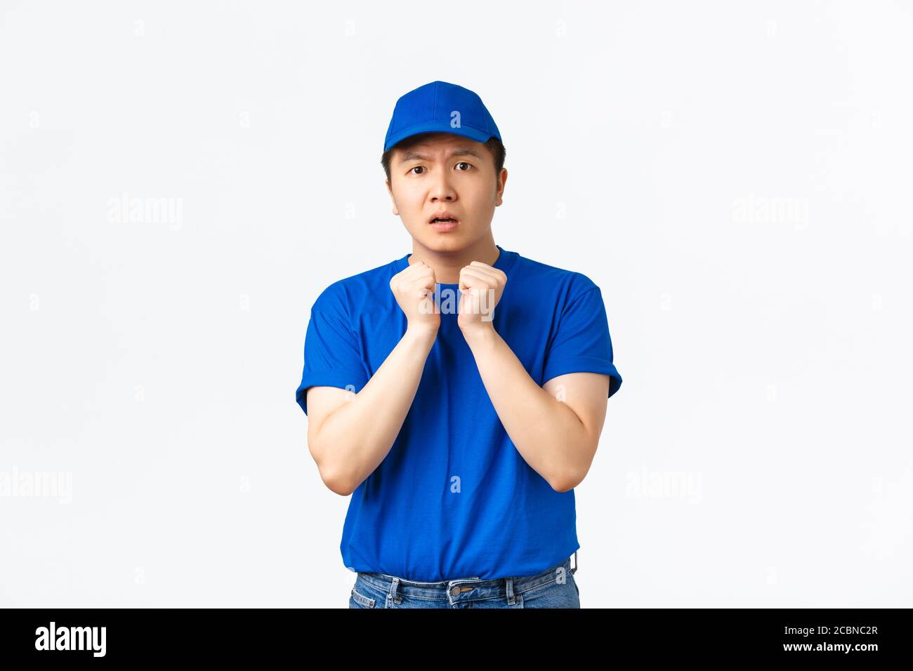 Worried concerned asian delivery hi-res stock photography and images ...