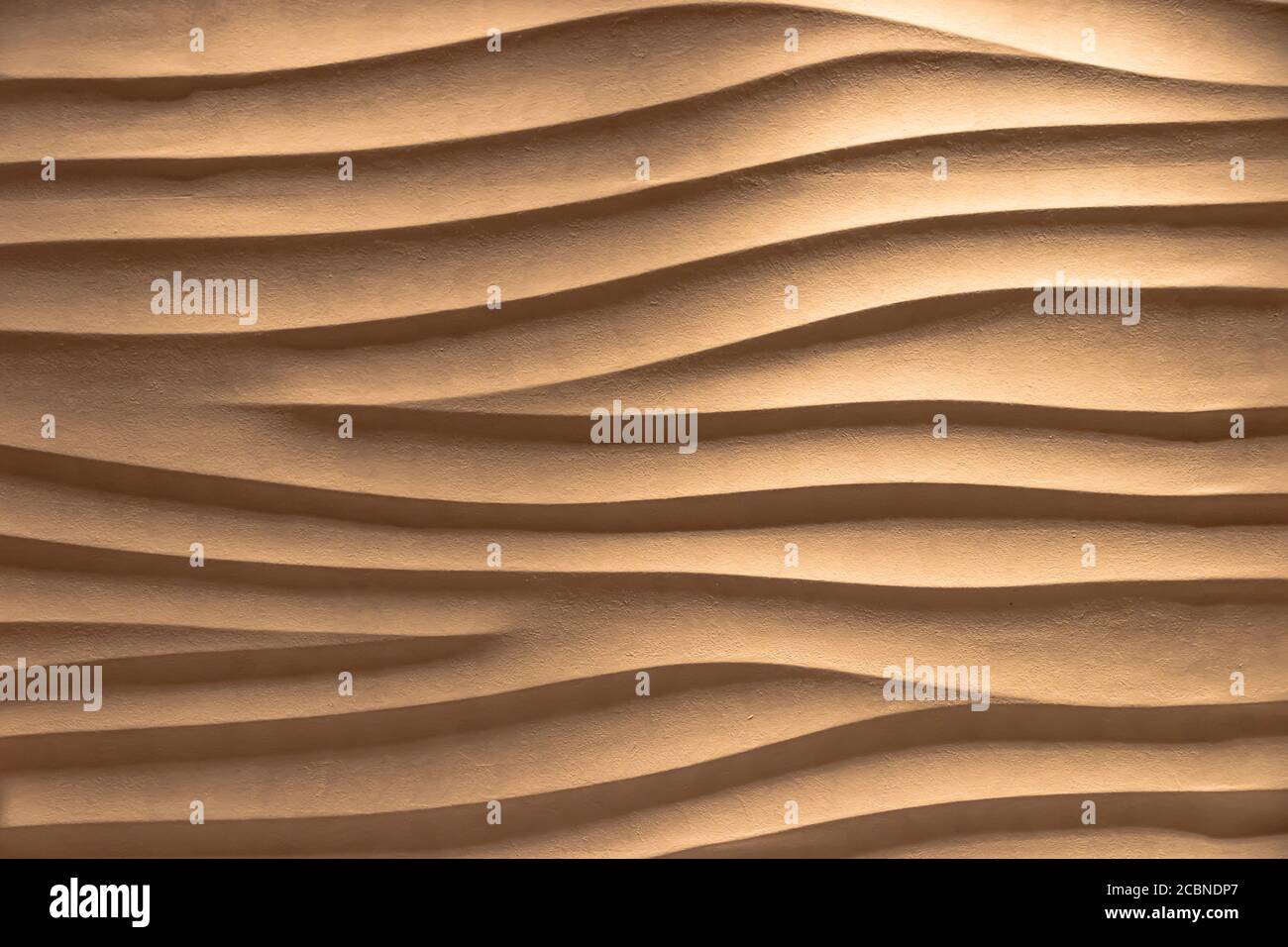 View of the wavy texture of wall design Stock Photo - Alamy
