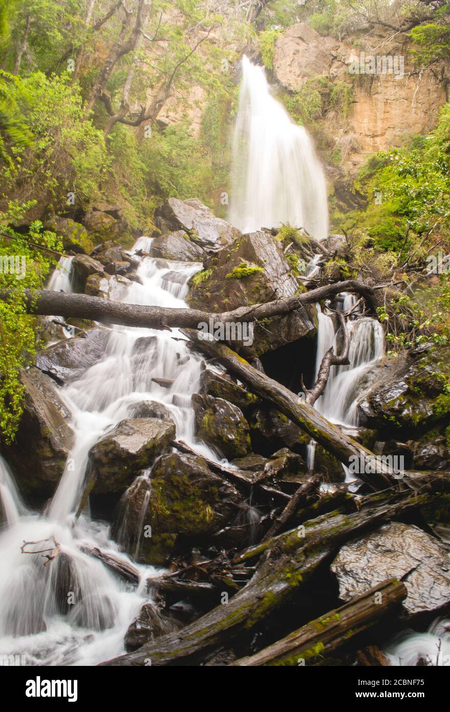 Vertical low angle shot of a majestic waterfall Stock Photo - Alamy