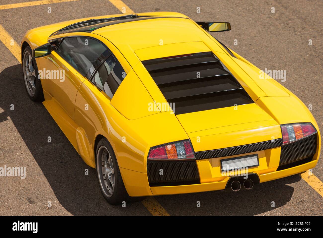 Yellow lamborghini rear view hi-res stock photography and images - Alamy