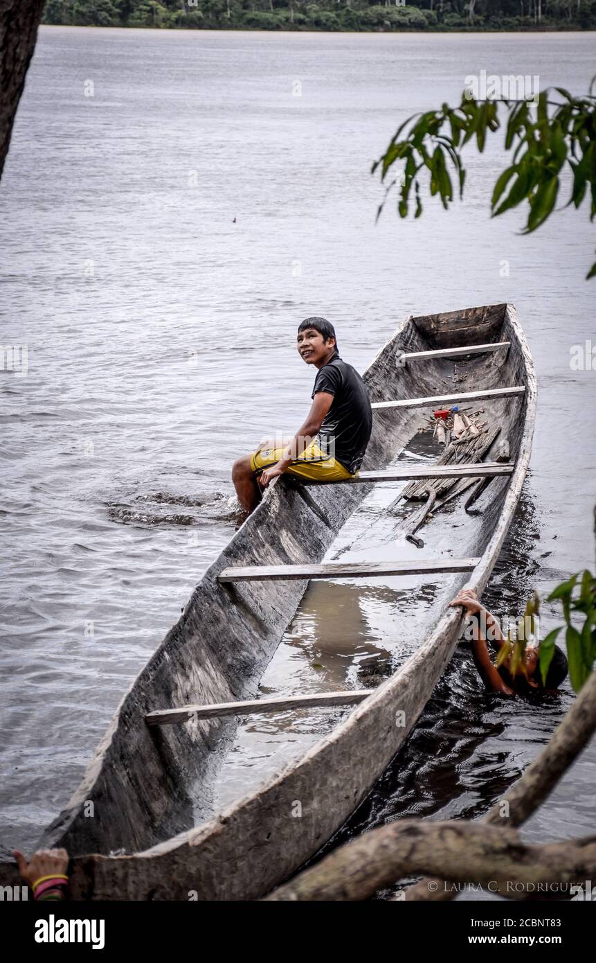 Boys at boat Stock Photo - Alamy